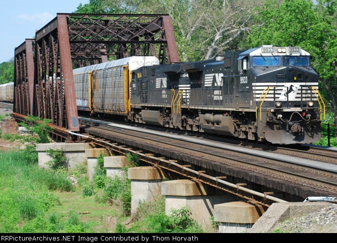 NS 9933 is on the point bringing 31 loaded autoracks east at 10:20